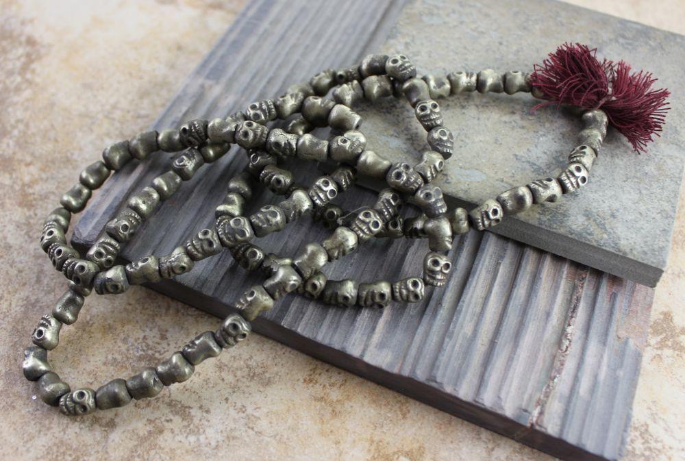 Hand Carved Metal Skull Mala - DharmaShop